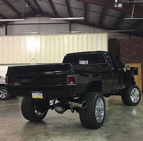 Black Chevy Truck In Garage