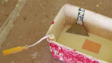 Red Bucket With Roller Brush And Pallet Are Stock Video Video Of Cardboard Construction