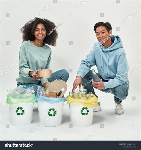 Smiling Black Girl Asian Man Sorting Stock Photo 2245674181 Shutterstock