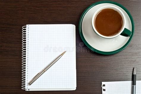 Open A Blank White Notebook Pen And Cup Of Coffee And Calculator Stock