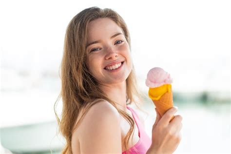 Premium Photo Young Redhead Woman At Outdoors