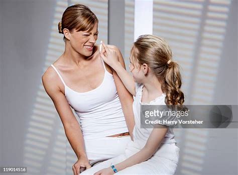 Two Girls Rubbing Each Other Photos And Premium High Res Pictures