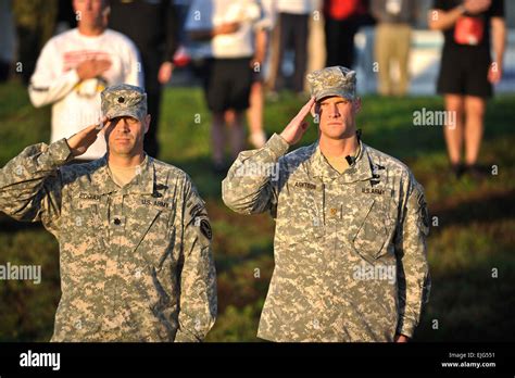 Us Army Lt Col Edgar And Maj Arntson Salute During The Playing Of