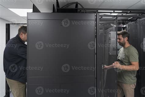 Technicians Team Updating Hardware Inspecting System Performance In