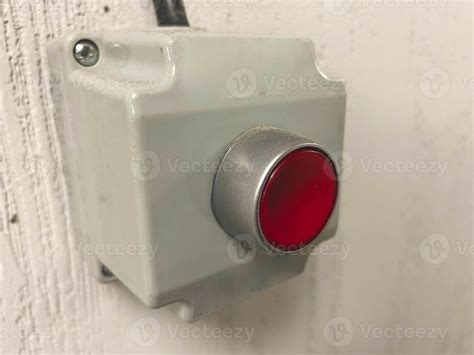 Red Alarm Button In A Gray Case The Alarm Is Connected With A Black Cable To Call The Guard