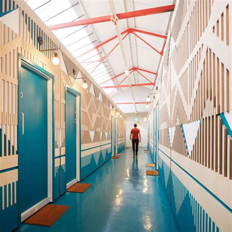 Alma Nac Slots Angular Openings Into Timber Clad Gables Of House In The