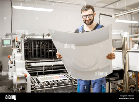 Checking Printing Quality At The Printing Plant Stock Photo Alamy