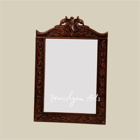 Intricately Carved Wooden Mirror Frame