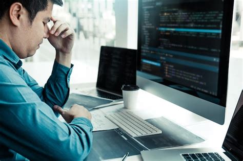 Premium Photo Software Developers Headache With Code Analysis In The Office