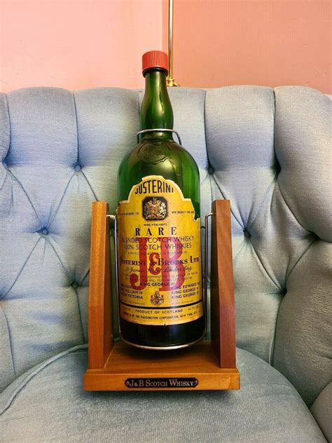 Download J&b Rare Whisky Giant Bottle Wallpaper | Wallpapers.com