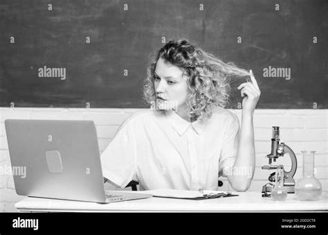 Girl In Classroom Laboratory With Computer Student With Microscope And Beaker Biology