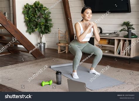 Young Asian Fitness Girl Doing Squats库存照片2097956893 Shutterstock