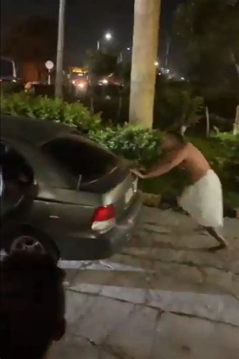 En video los pilló el esposo en un motel de Barranquilla y el amante terminó empujando un carro