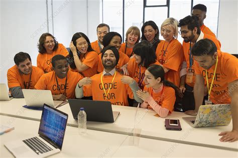 Portrait Hackers Coding For Charity At Hackathon Stock Image F022