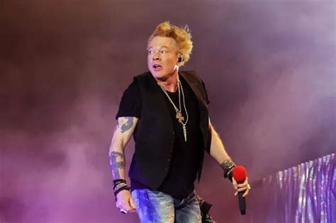 Axl Rose Vows To Stop Throwing Microphone After Reportedly Injuring Fan