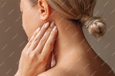 Premium Photo Inflamed Tonsillar Lymph Nodes Young Woman Touches