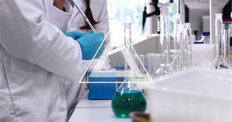 Animation Of White Shapes Over Diverse Scientists In Lab Stock Footage Video Of People