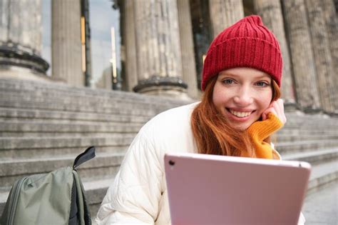 Free Photo Close Up Portrait Of Cute Redhead European Girl Sitting In