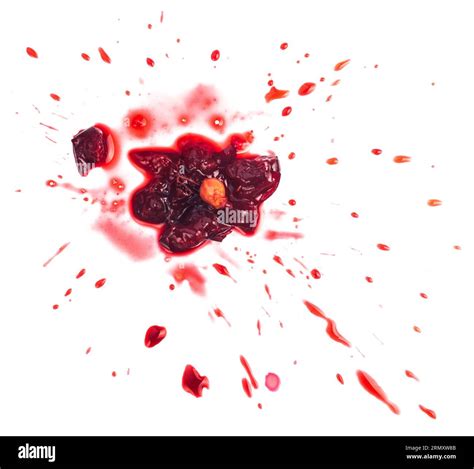 Squashed Ripe Sour Cherry In The Puddle Of Red Juice Isolated On White