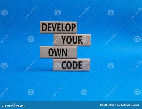 Develop Your Own Code Symbol Concept Words Develop Your Own Code On Wooden Blocks Beautiful