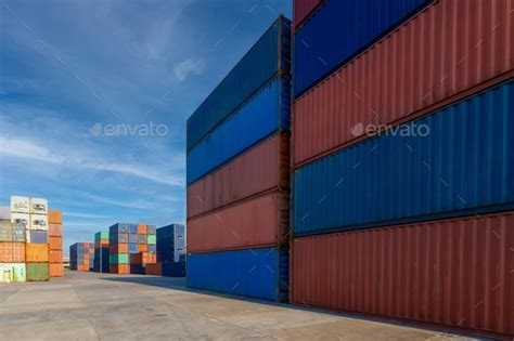 Stack Of Containers In A Harbor Shipping Containers Stacked On Cargo Ship Stock Photo By Kckate