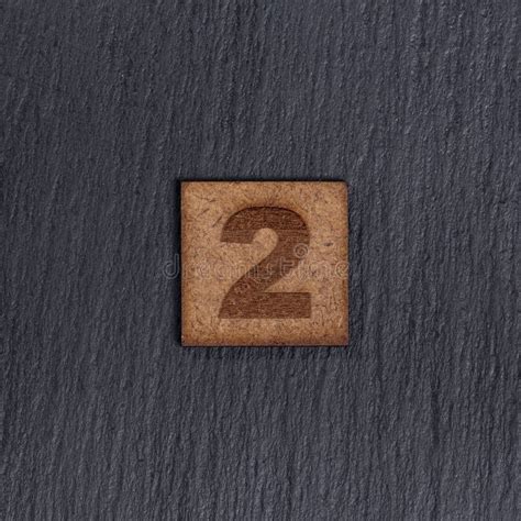 Number In Square Wooden Tiles Number On Black Stone Background Stock Image Image Of Reading