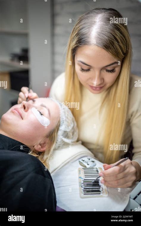 Eyelash Extension Procedure In Beauty Salon Lashes Close Up Concept