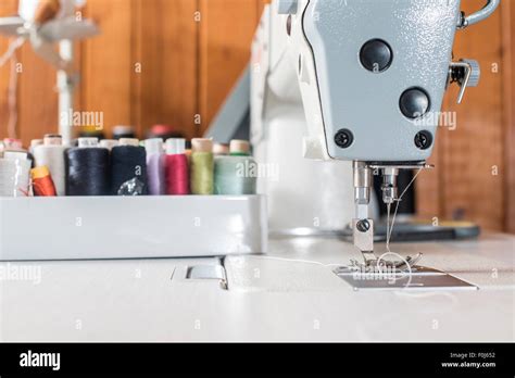 Woman Sewing On A Sewing Machine Close Up Stock Photo Alamy