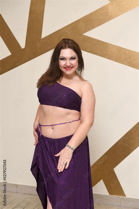 Beautiful Plump Girl Model With Curvy Curves In The Studio In An