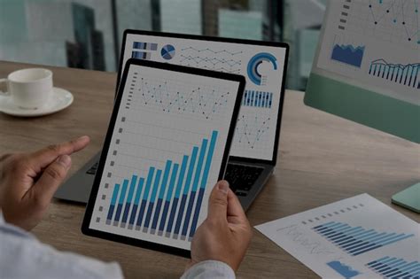 Premium Photo Kpi Business Analytics Finance Graph Chart Report On The Tablet Screen Data Premium Photo Kpi Business Analytics Finance Graph Chart Report On The Tablet Screen Data