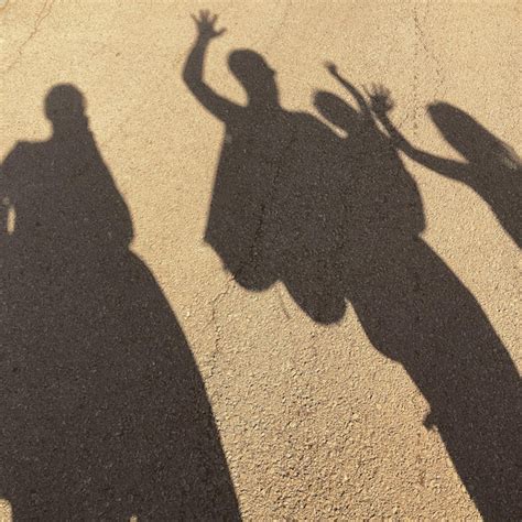 Premium Photo Shadow Of People Gesturing On Street