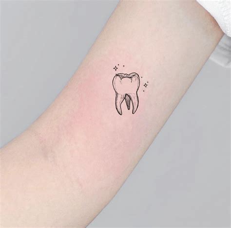 Single Tooth Tattoos