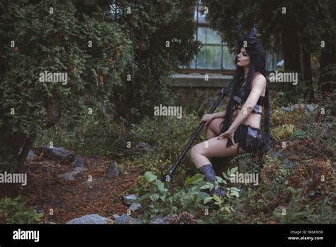 Portrait Of A Beautiful Girl From A Tribe With A Spear Stock Photo Alamy