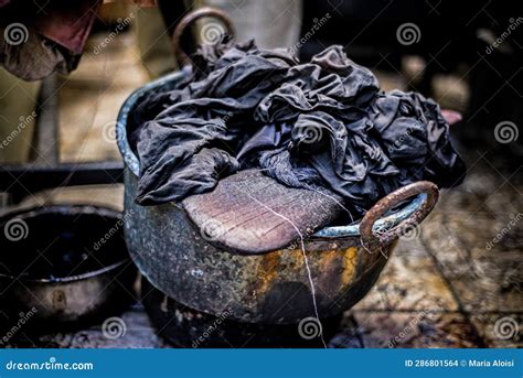 Fabric Dyeing Process With Traditional Method And With Natural Colors And Materials Stock Photo