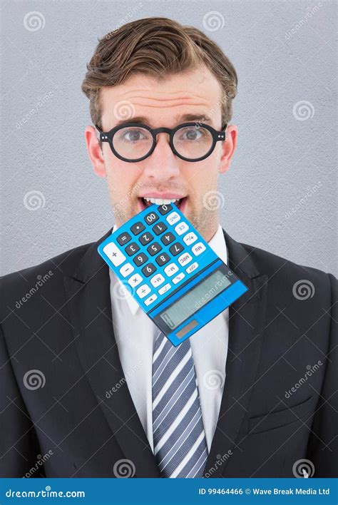 Nerd Man With Calculator In Mouth Against Grey Wall Stock Photo Image Of Nerd Male
