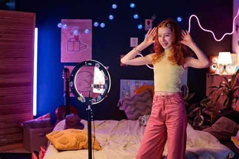 Premium Photo Teen Girl Recording Video On Smartphone