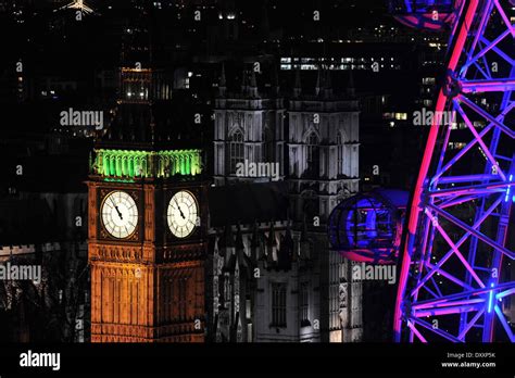 Big Ben And The London Eye Are Lit Before The Fireworks Displays Marking The Arrival Of The New