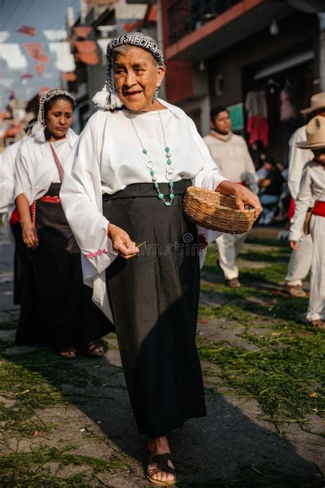 Old Mexican Woman With Traditional Customs Holding Sweet Basket During