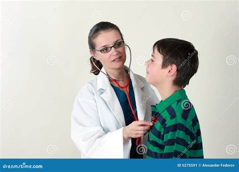 Doctor Assessing Patient By Stethoscope Stock Image