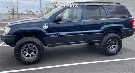 2004 Jeep Grand Cherokee With 16x8 Vision Flow And 265 75r16 Falken