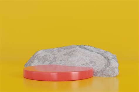 3d 렌더링 주황색 실린더 연단 스탠드에는 브랜드 제품 전시를 위한 천연 암석 원형 받침대가 있습니다 광고 디자인을 위한 모형 템플릿 프리미엄 사진