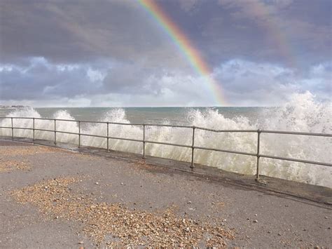 Rainbow And Waves Bouncing Off The Wall Stock Image Image Of Horizon