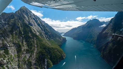 Download Two Ships Sailing Milford Sound Wallpaper