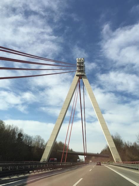 Premium Photo Cable Stayed Bridge Against Cloudy Sky