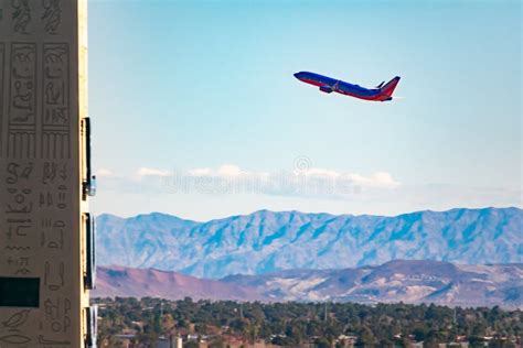 Plane Flying Over Las Vegas Nevada Editorial Photo Image Of Cityscape
