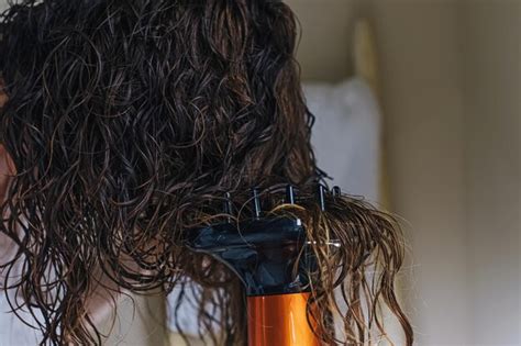 Premium Photo Woman Diffusing Her Hair With Dryer Drying Hair According To Curly Method For Premium Photo Woman Diffusing Her Hair With Dryer Drying Hair According To Curly Method For