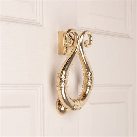 Loop Door Knocker In Brass By Adams And Mack