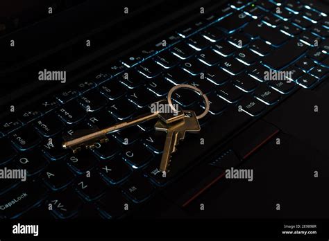 Two Keys On Laptop Keyboard Closeup Image Indoors Shot Stock Photo Alamy