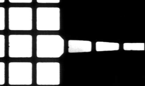 Photograph As In Figure 1 Of Double Layer Stencil With Part Of The