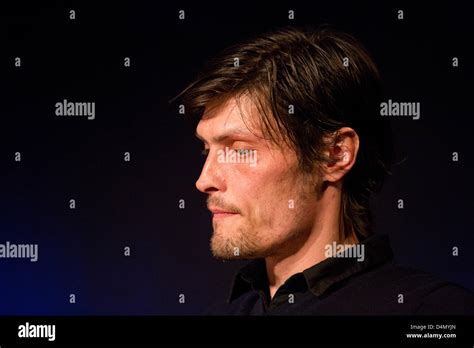 Actor Stipe Erceg Sits Onstage During A Reading Of The Book Ukulele Jam At The Literature